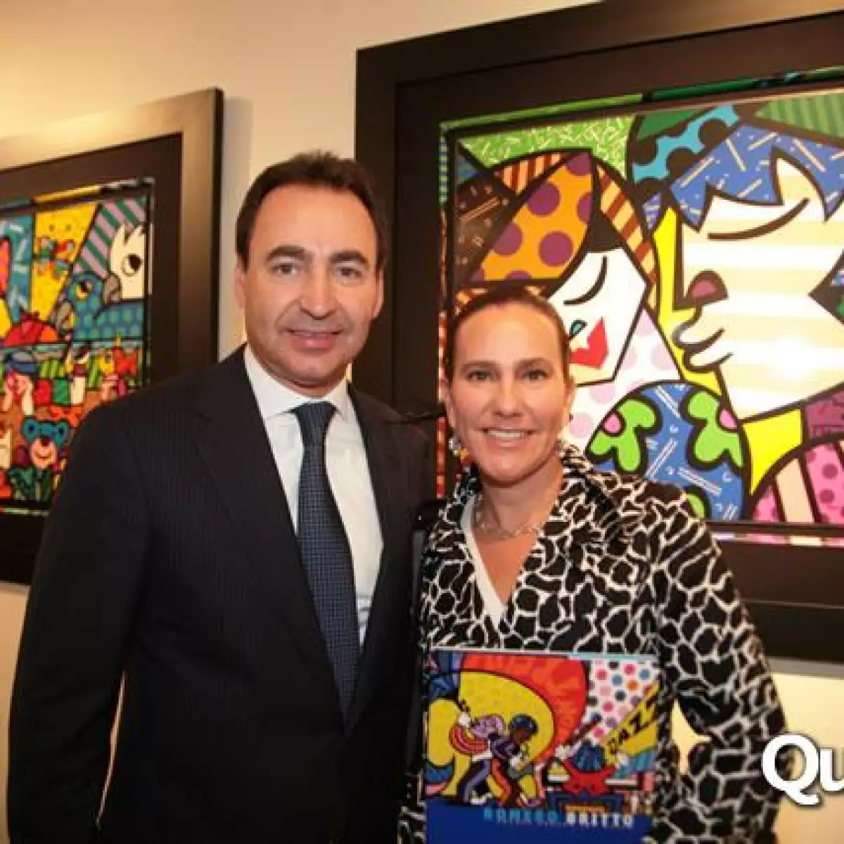 Marc y Renata Pariente en exposición de Romero Britto