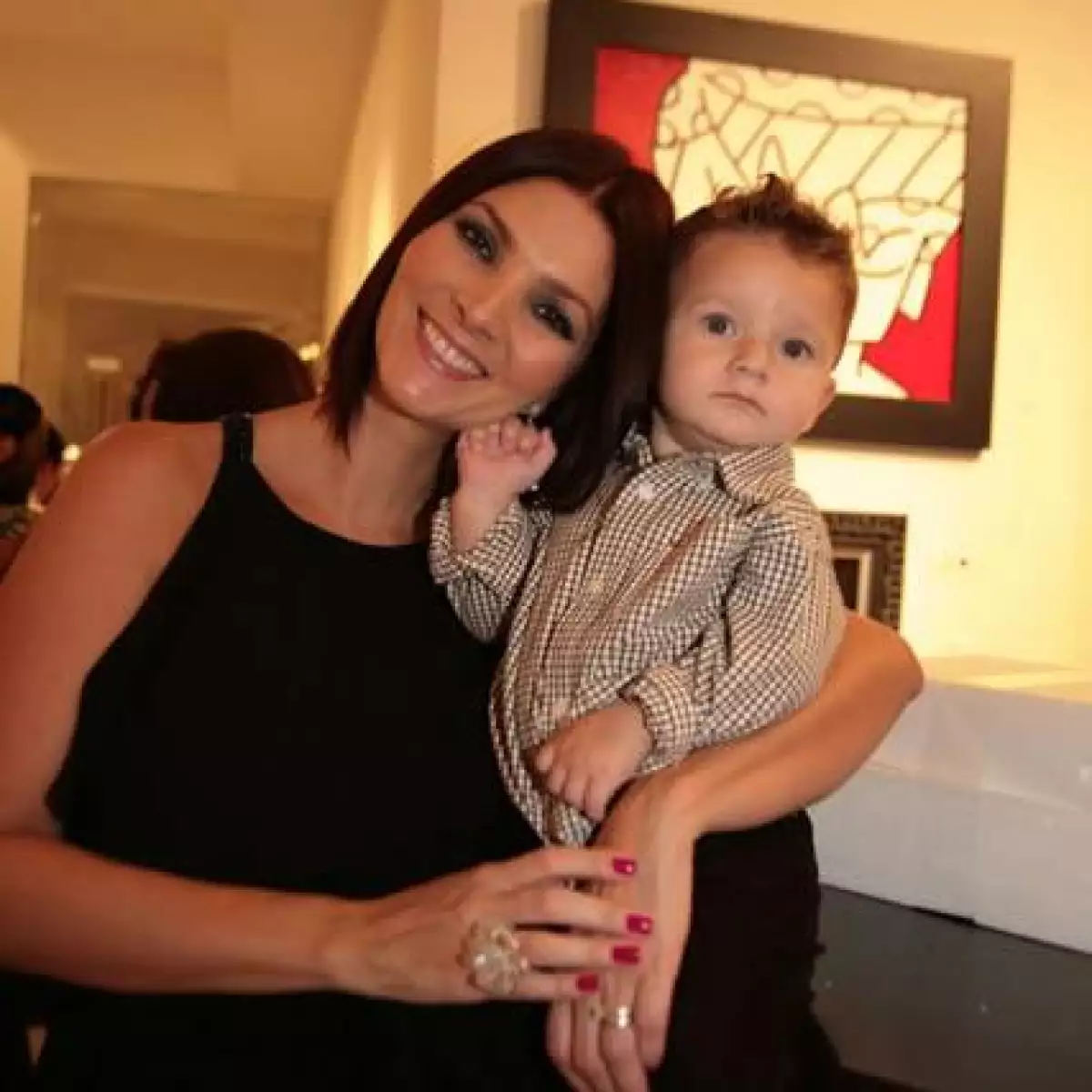 Marc y Renata Pariente en exposición de Romero Britto