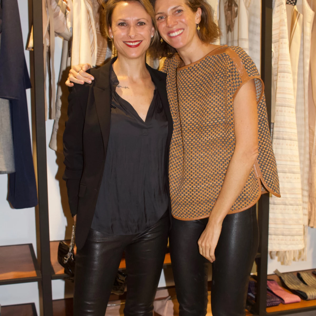 Gina Barrios y Alessandro Cerutti en el coctel de Caravana Americana