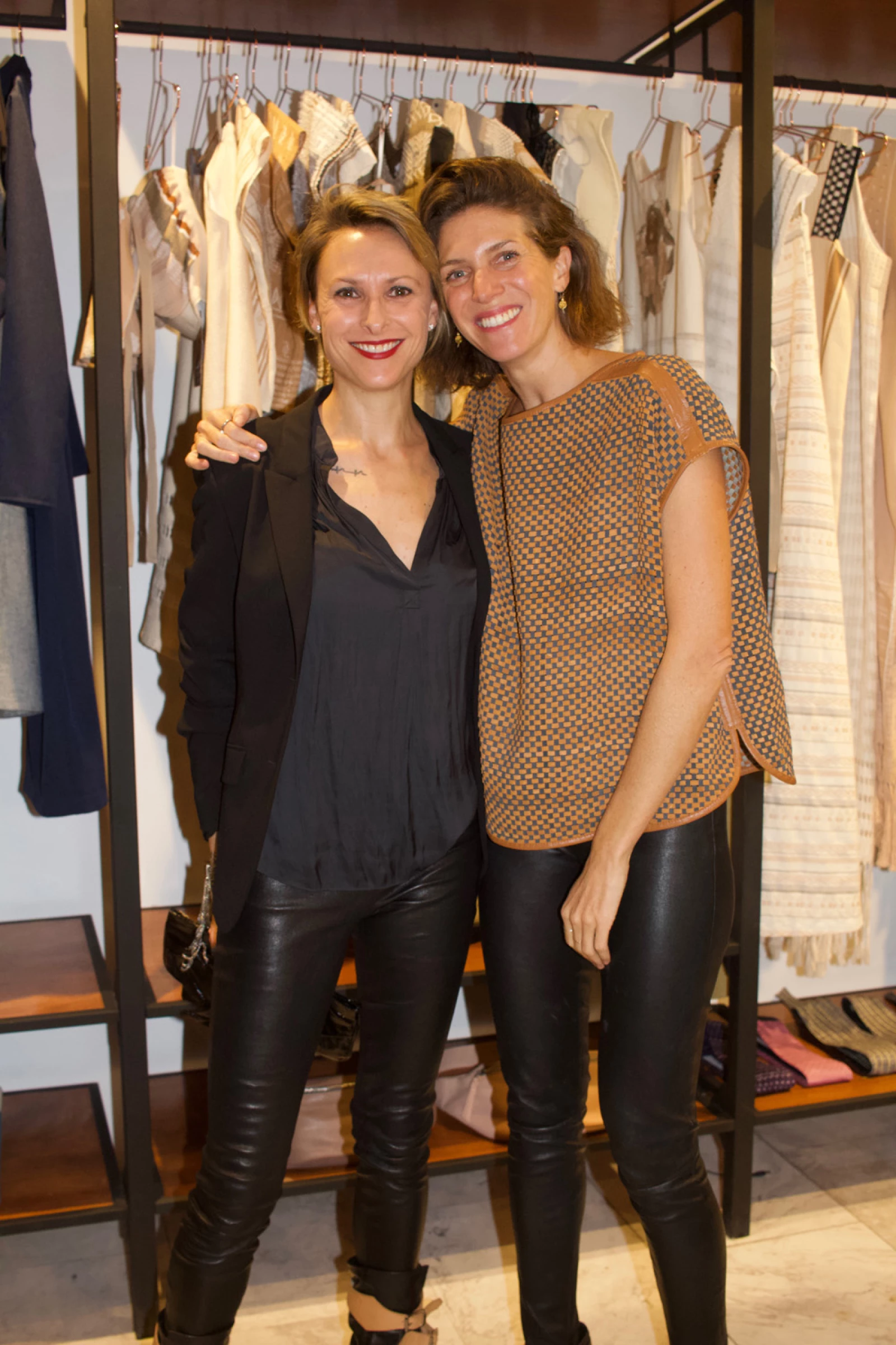 Gina Barrios y Alessandro Cerutti en el coctel de Caravana Americana